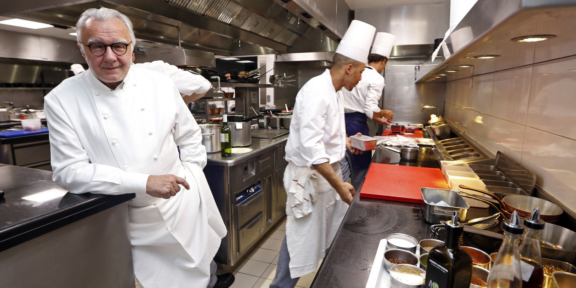 French chef Alain Ducasse poses in the kitchen of the Le Meurice ...